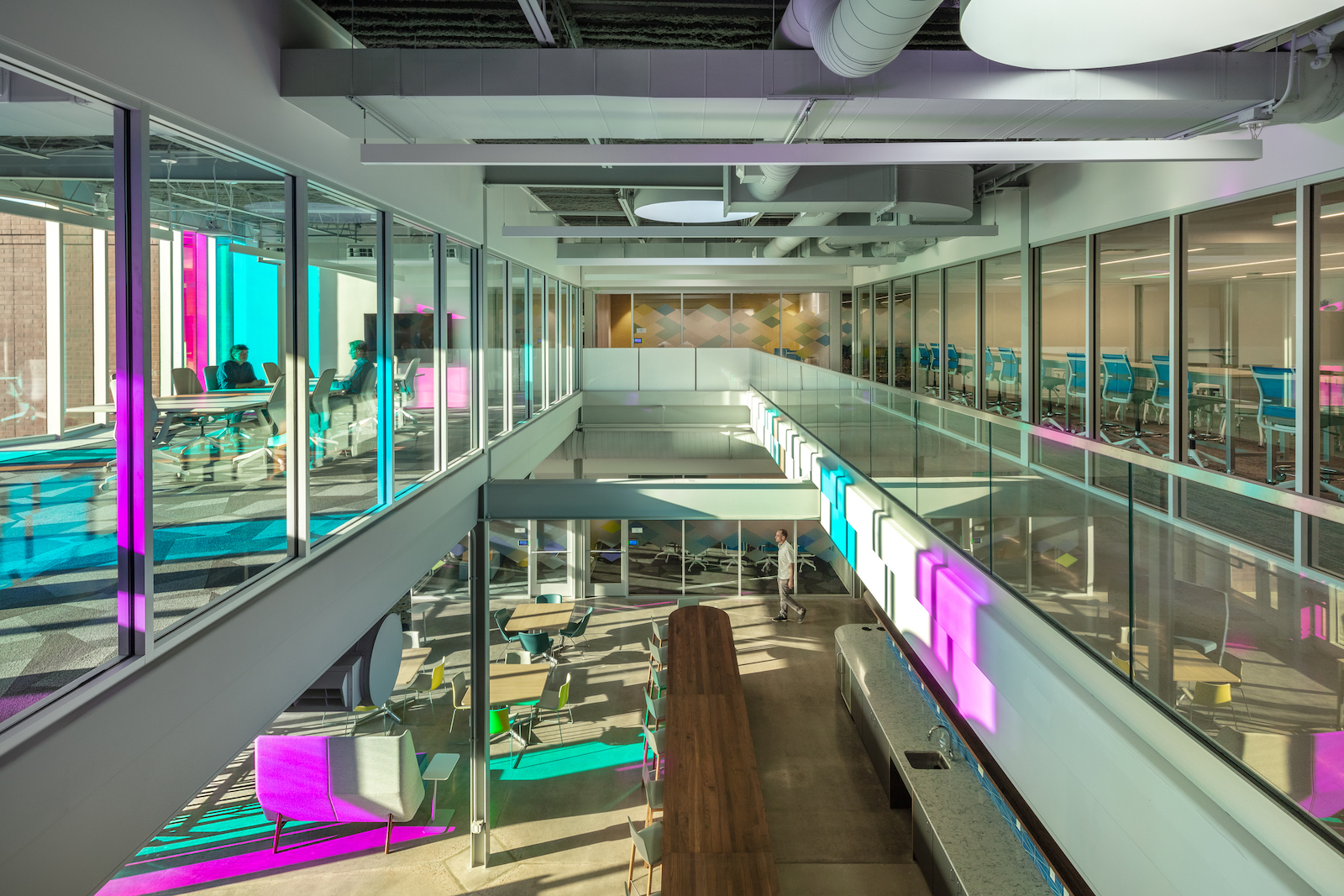 A Rainbow-Colored ‘Prism Plane’ Punches Up a Nondescript Office ...